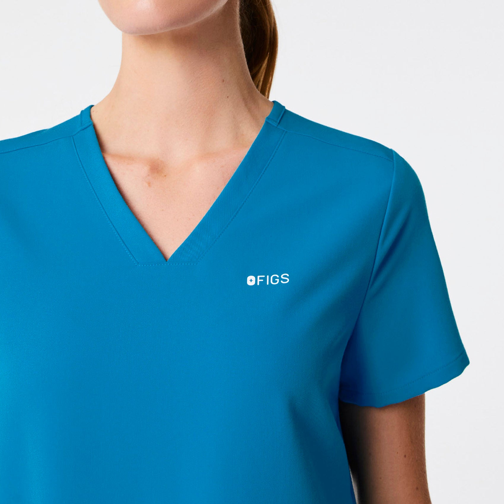 Women's Casma Three-Pocket Scrub Top™ - Extreme Blue · FIGS