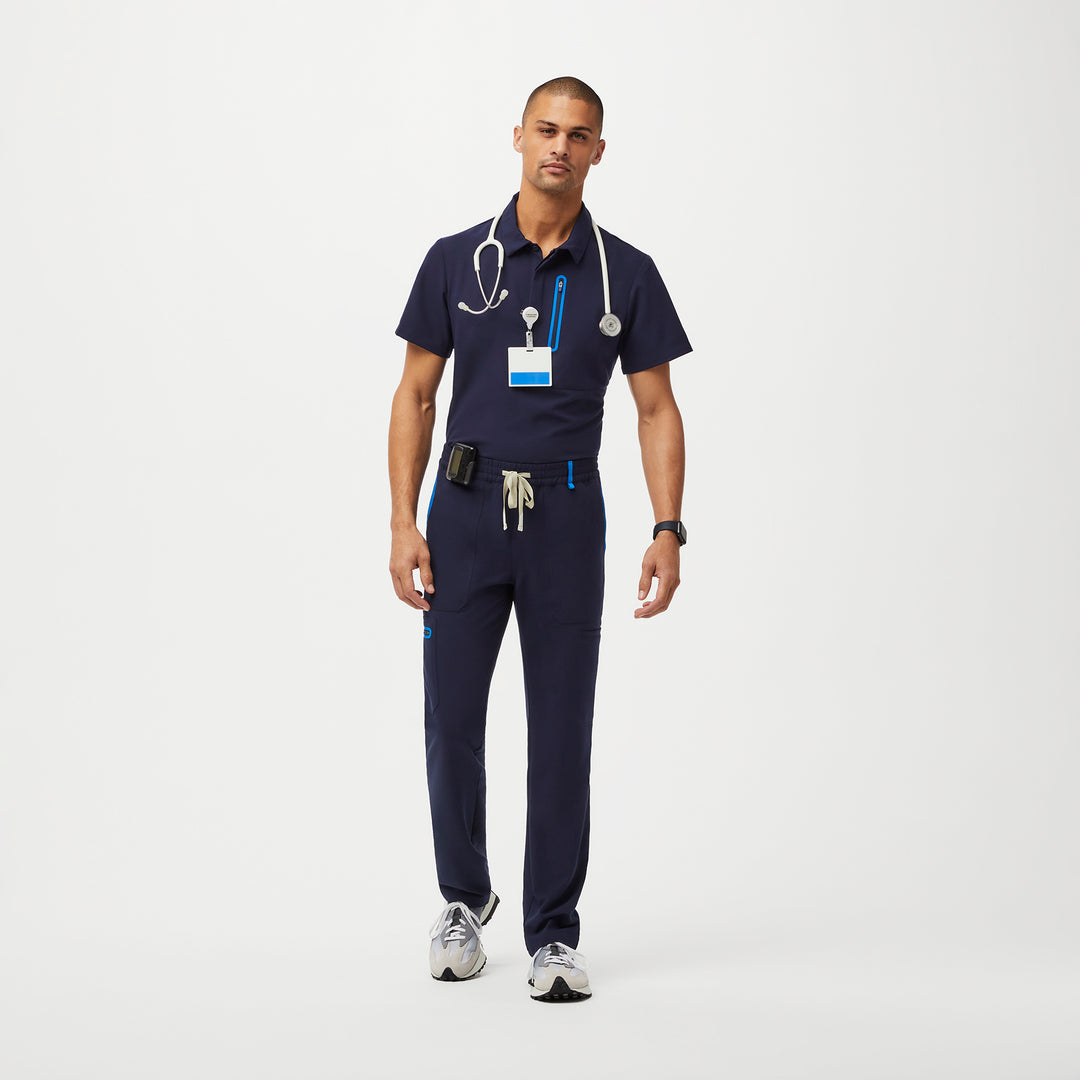 Pantalón médico de rendimiento Apac en contraste para hombre - Azul ...